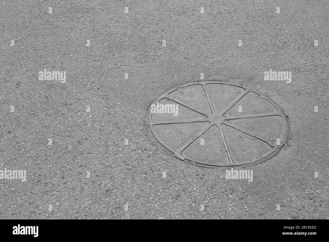 Metal sewer hatch on asphalt outdoors, space for text Stock Photo - Alamy