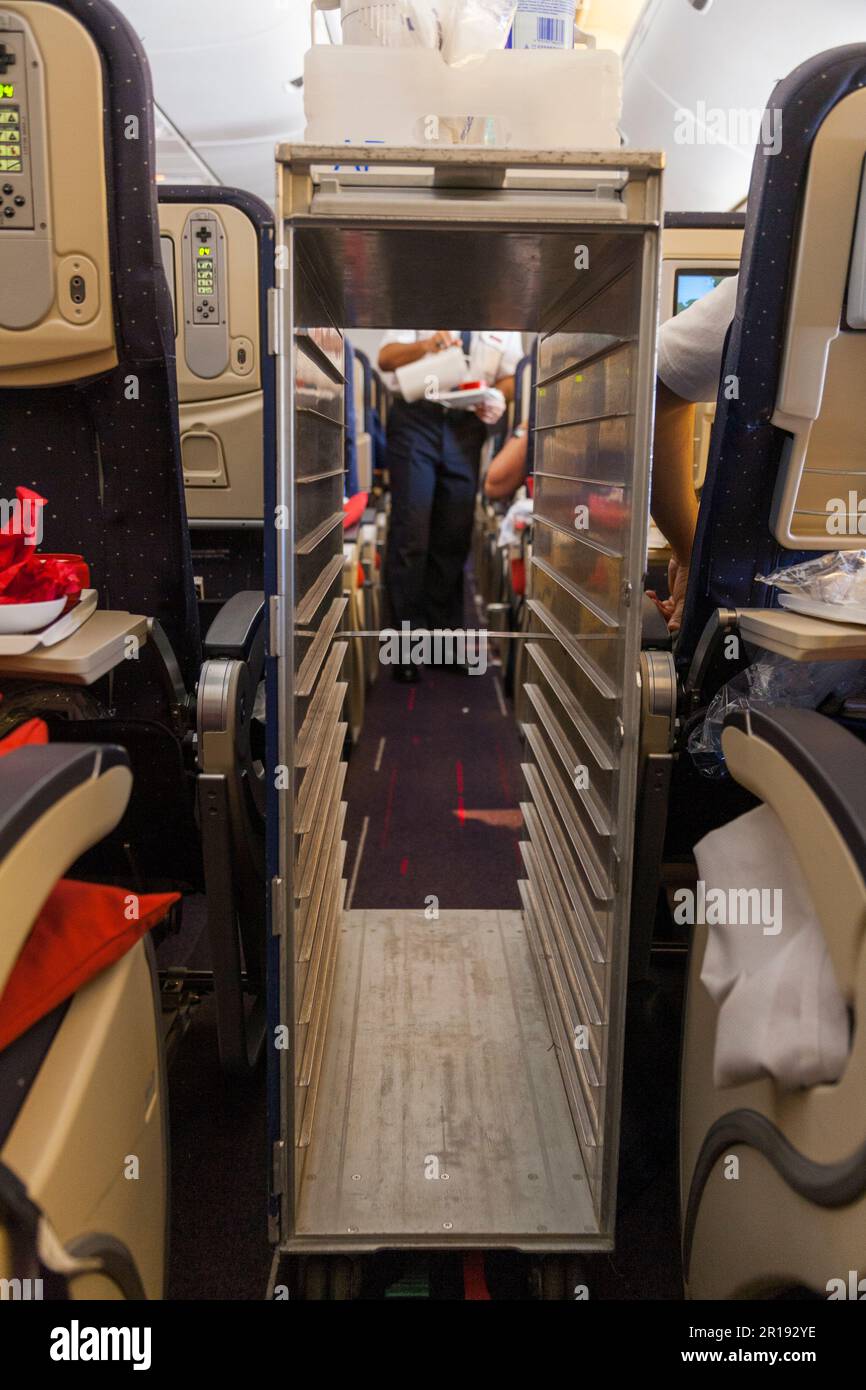 An empty airline meal food and drinks / drink trolley cart in the plane ...