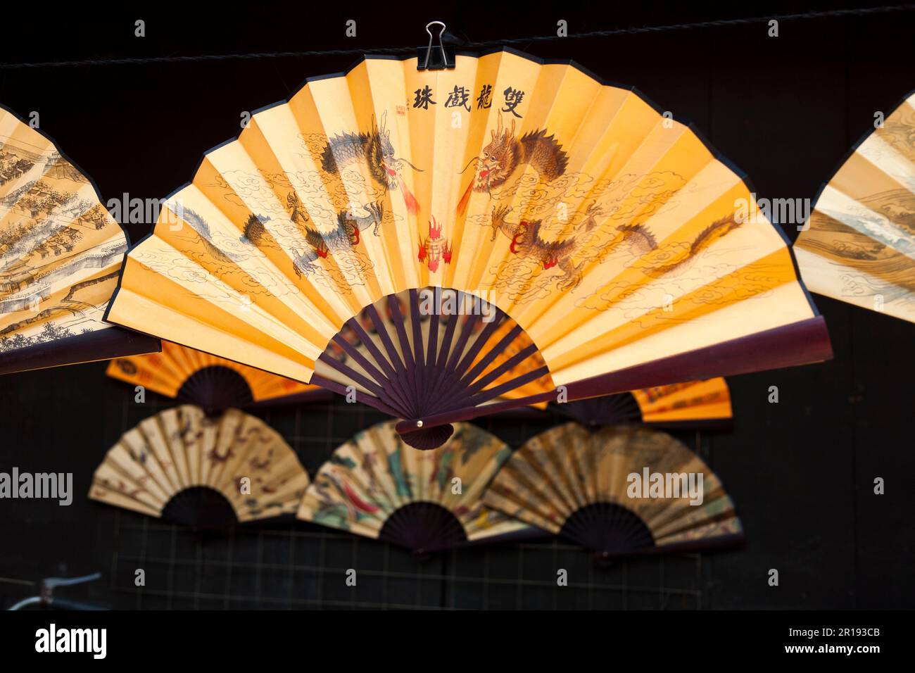 Hand painted fan / fans for sale to tourists in a gift and souvenir ...