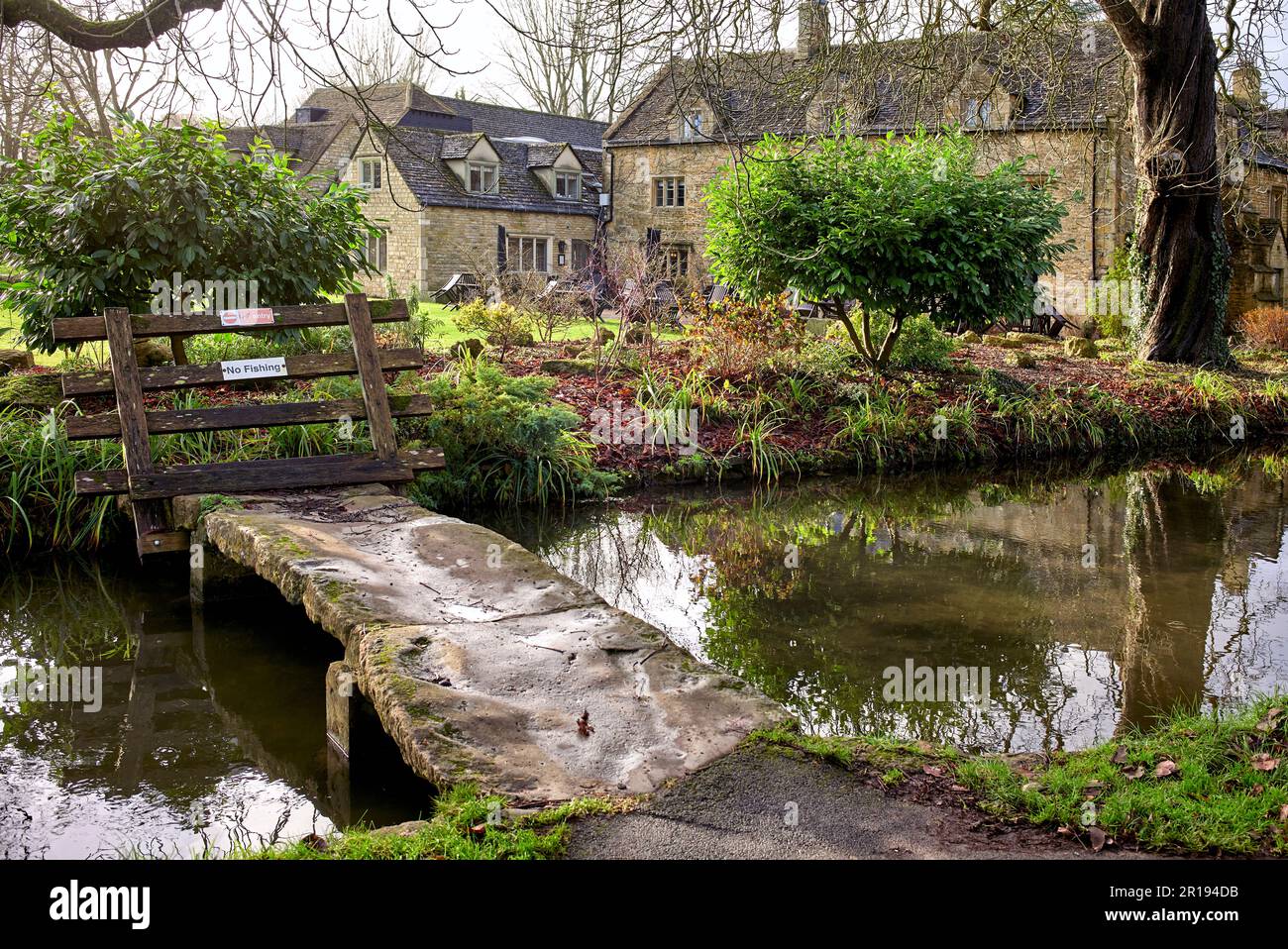 Stone footbridge over the River Eye in the Cotswolds village of Lower ...