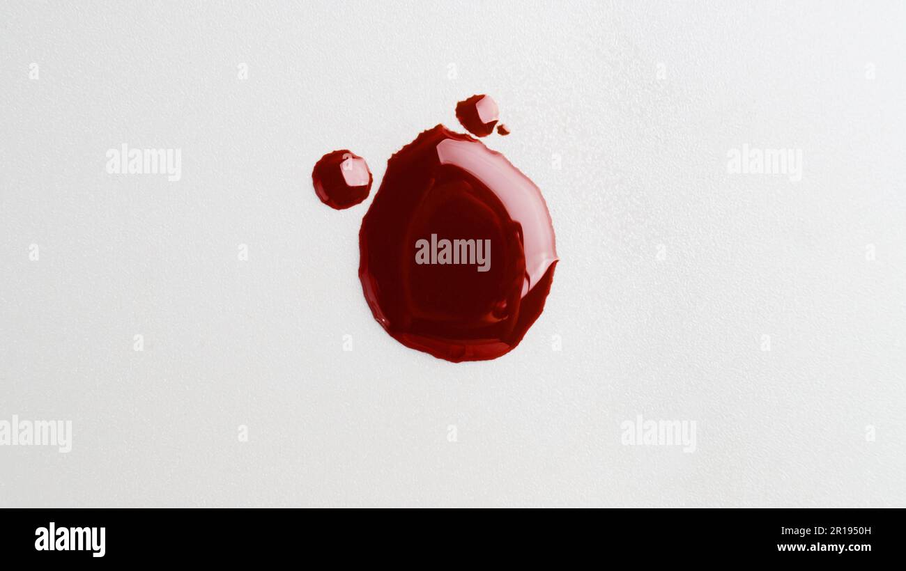 Drops of blood on grey background, top view Stock Photo - Alamy