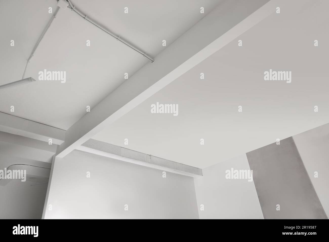 Ceiling with modern ventilation system in renovated room Stock Photo ...