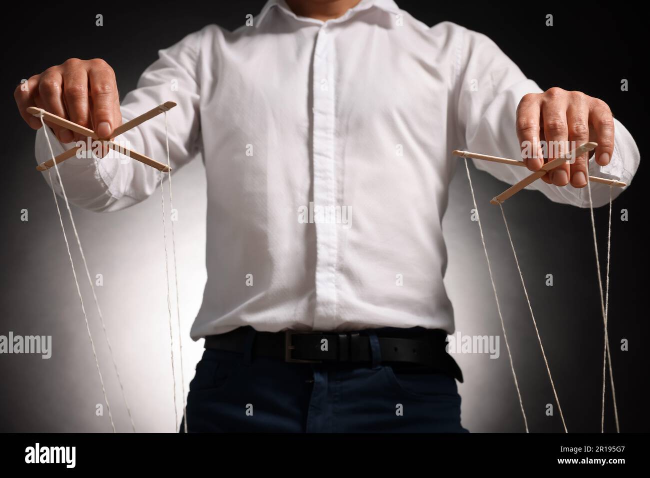 Puppet strings dark hi-res stock photography and images - Alamy