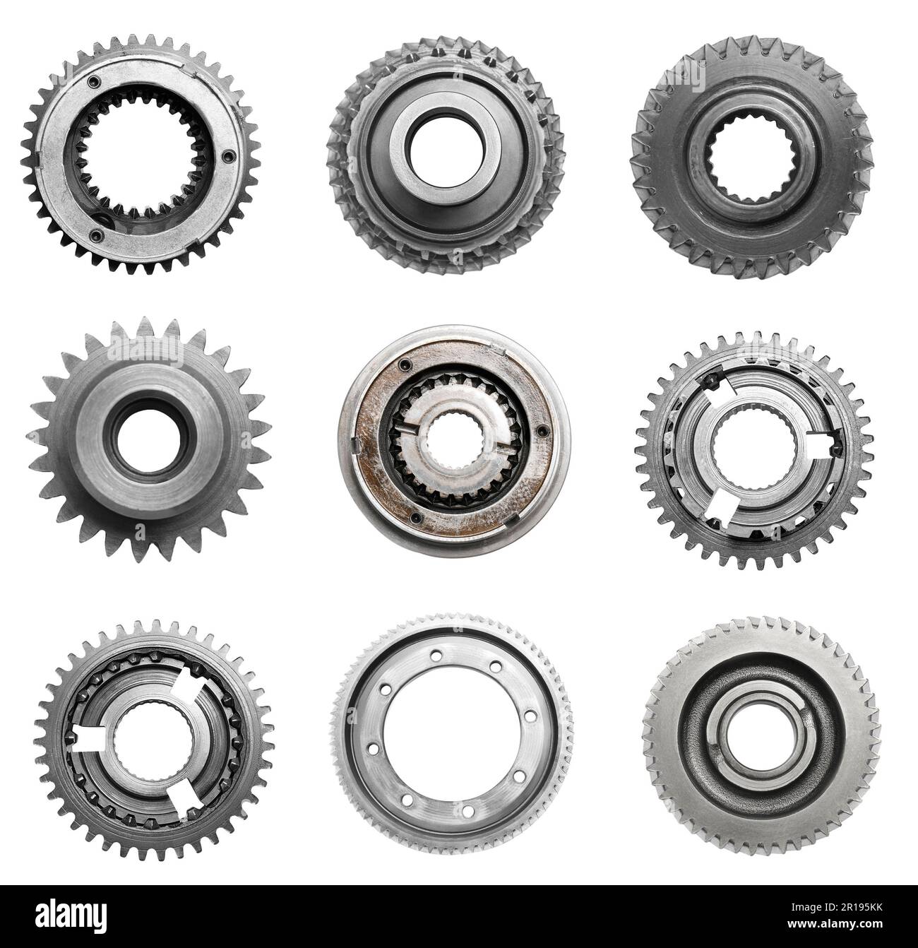 Set with different stainless steel gears on white background, top view ...