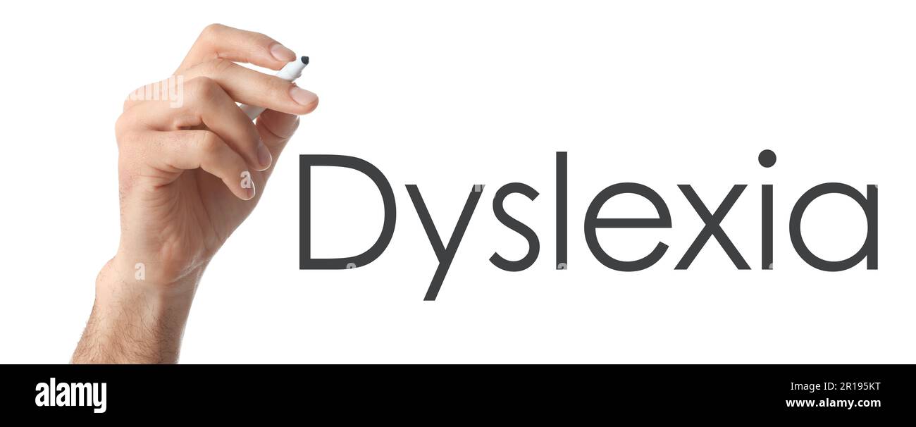 Man writing word Dyslexia on white background, closeup. Banner design ...