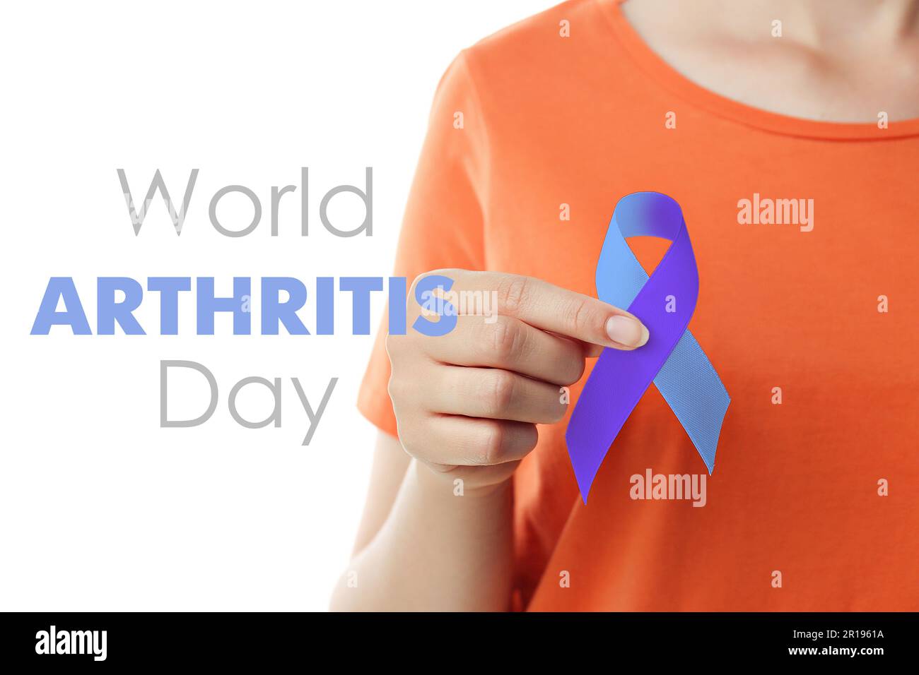 World Arthritis Day. Woman with blue and purple awareness ribbon on ...