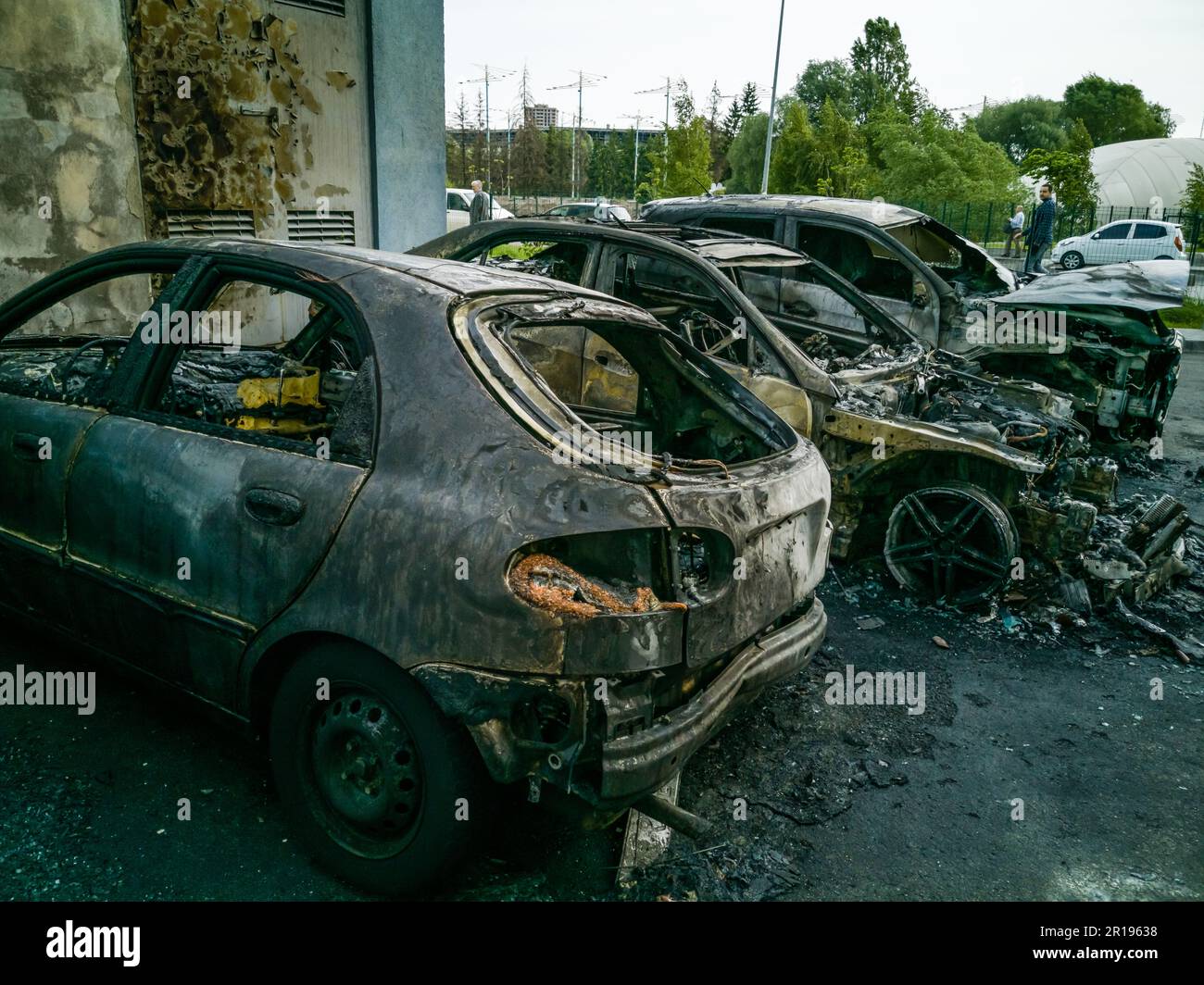 A cropped front view of a burned and abandoned rusty cars Stock Photo ...