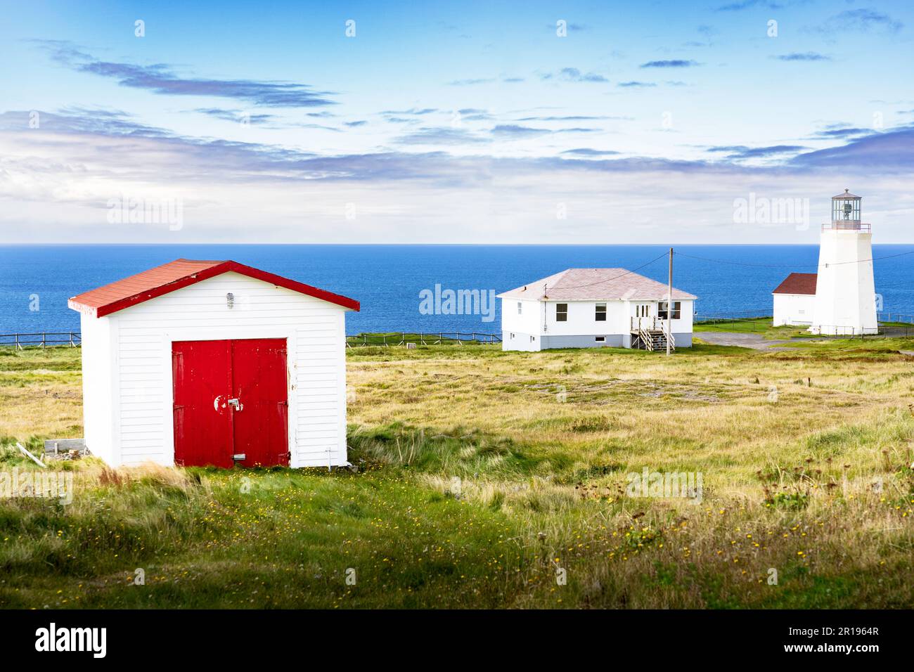 Lighthouse and East Coast buildings overlooking the Atlantic Ocean at ...