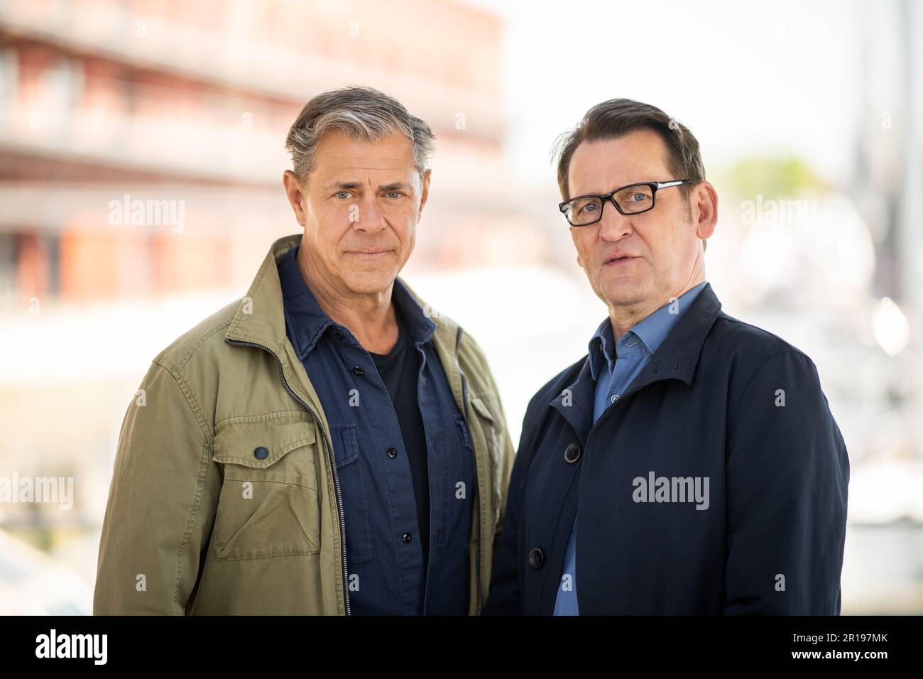 12 May 2023, Schleswig-Holstein, Lübeck: Actors Sven Martinek (l) and ...