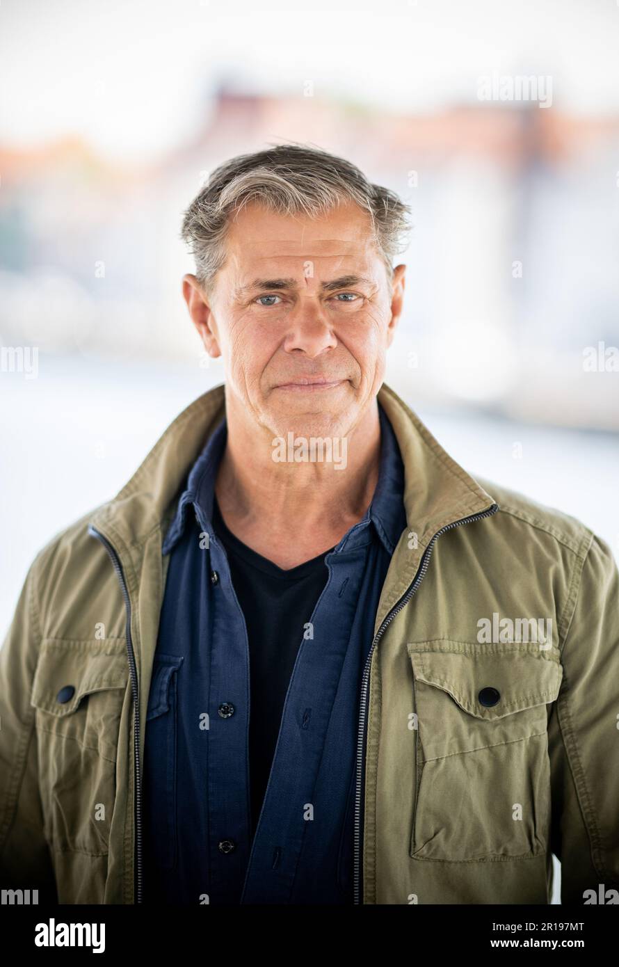 12 May 2023, Schleswig-Holstein, Lübeck: Sven Martinek, actor, stands ...
