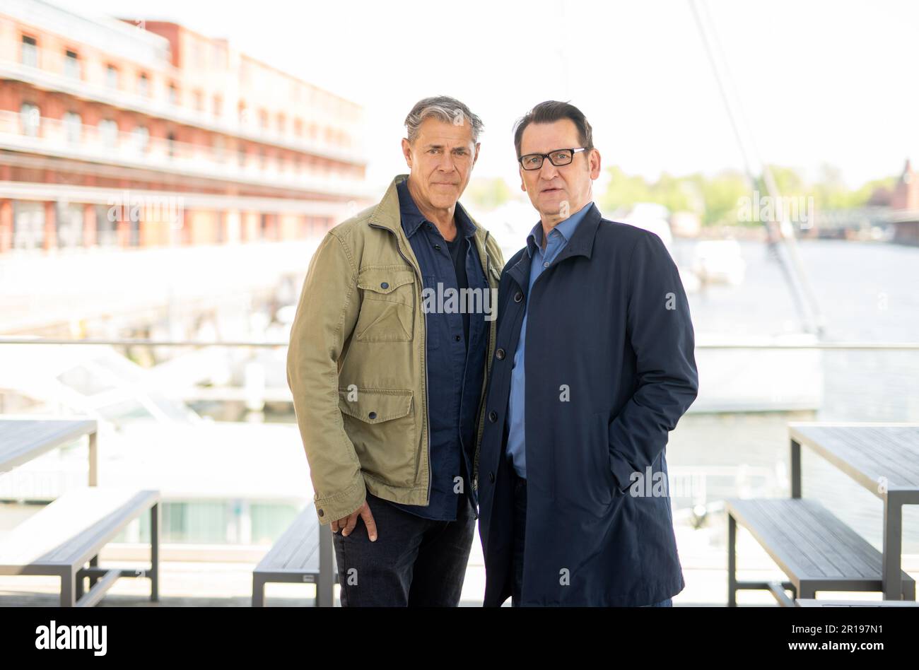 12 May 2023, Schleswig-Holstein, Lübeck: Actors Sven Martinek (l) and ...