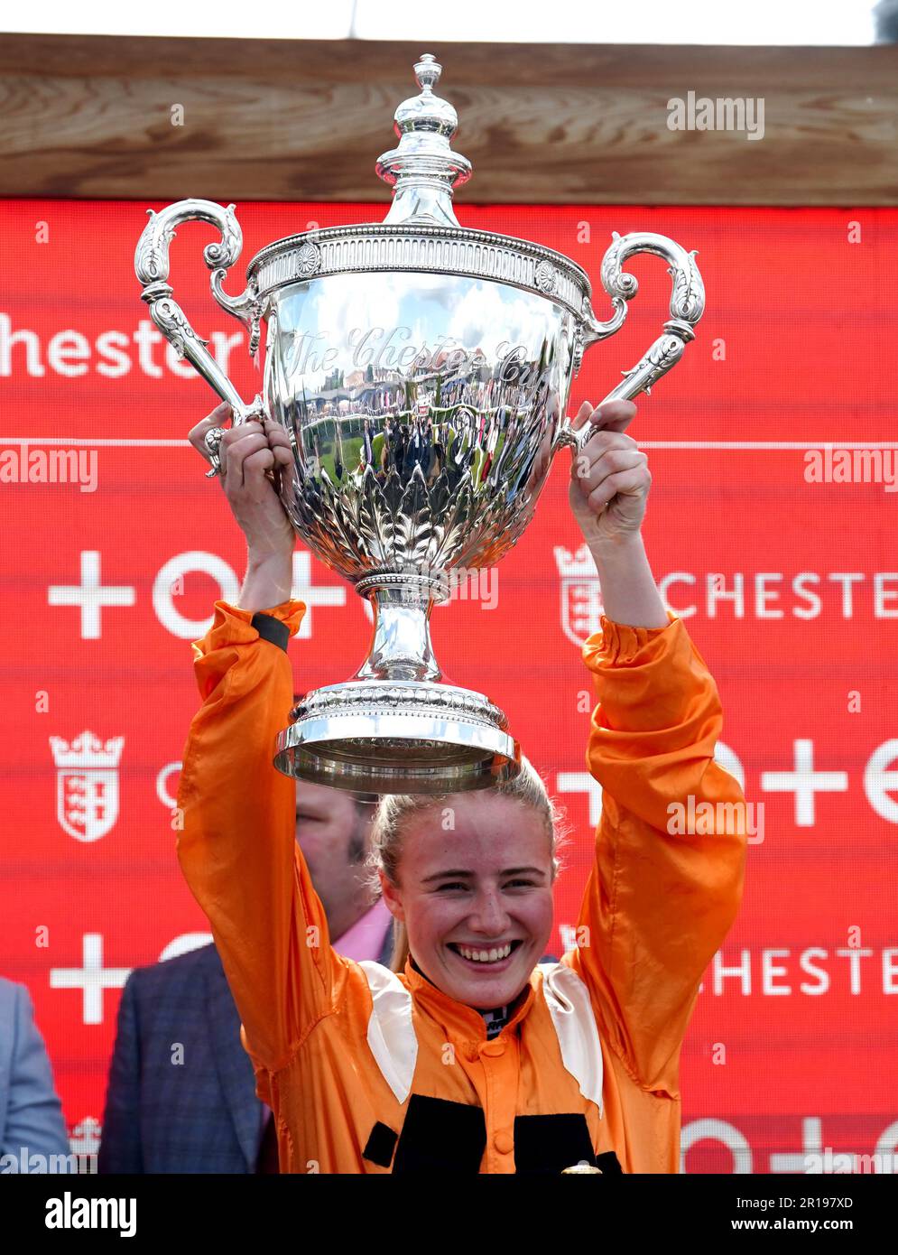 Jockey Saffie Osborne celebrates with The Chester Cup trophy after ...