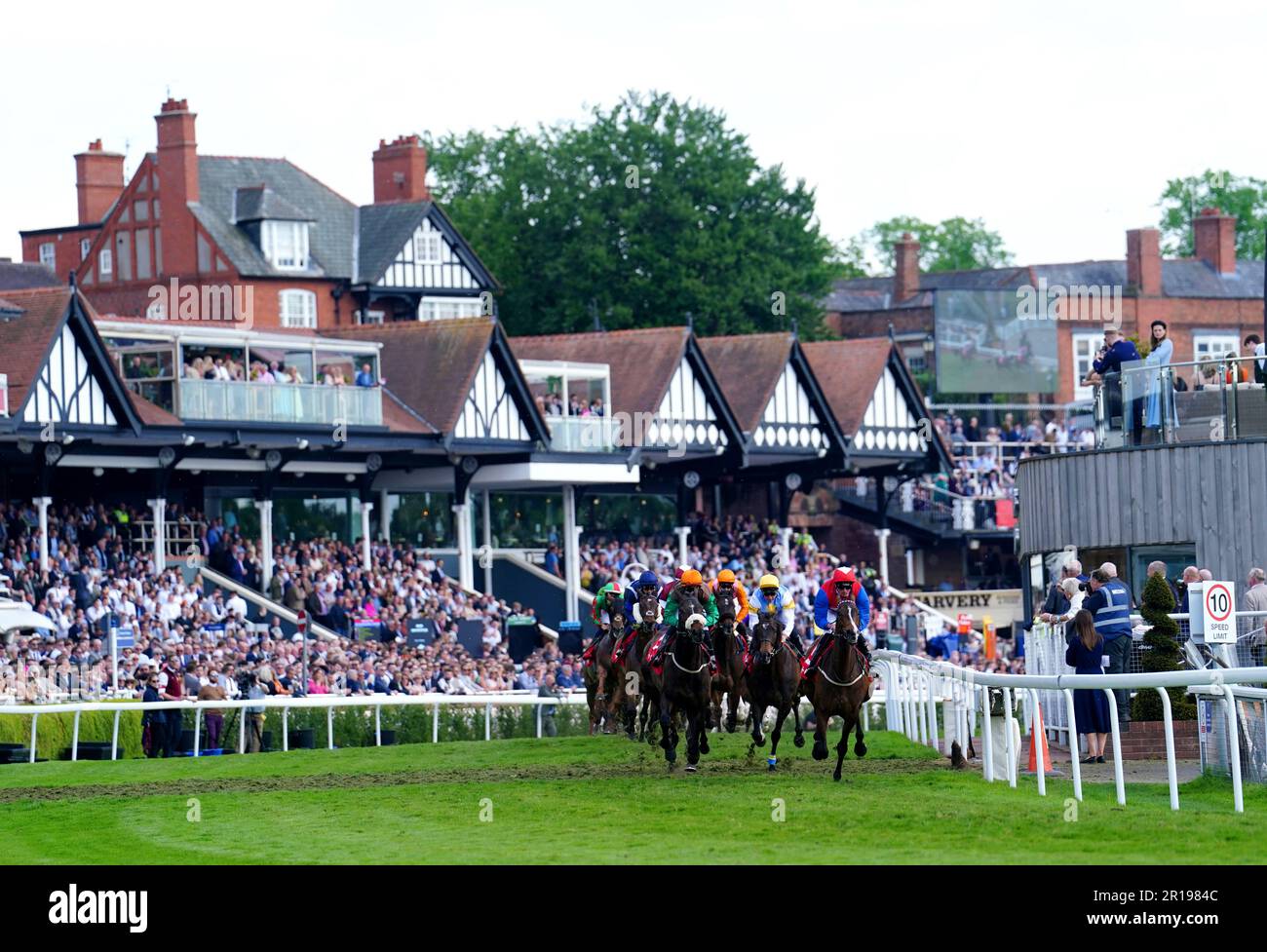 Runners and riders in action as they compete in the tote Chester Cup ...