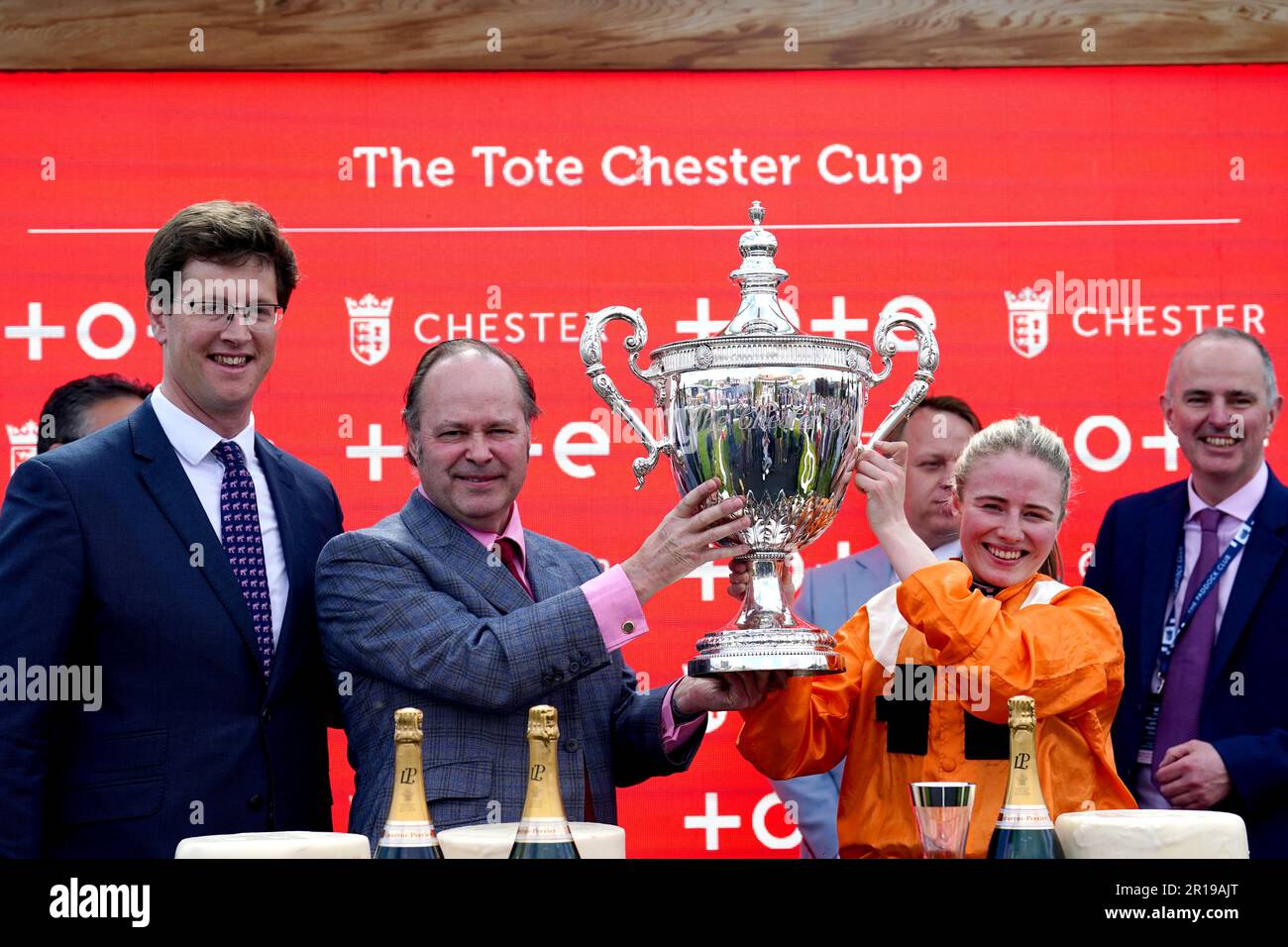 Jockey Saffie Osborne, trainer Harry Fry (left) and the winning ...