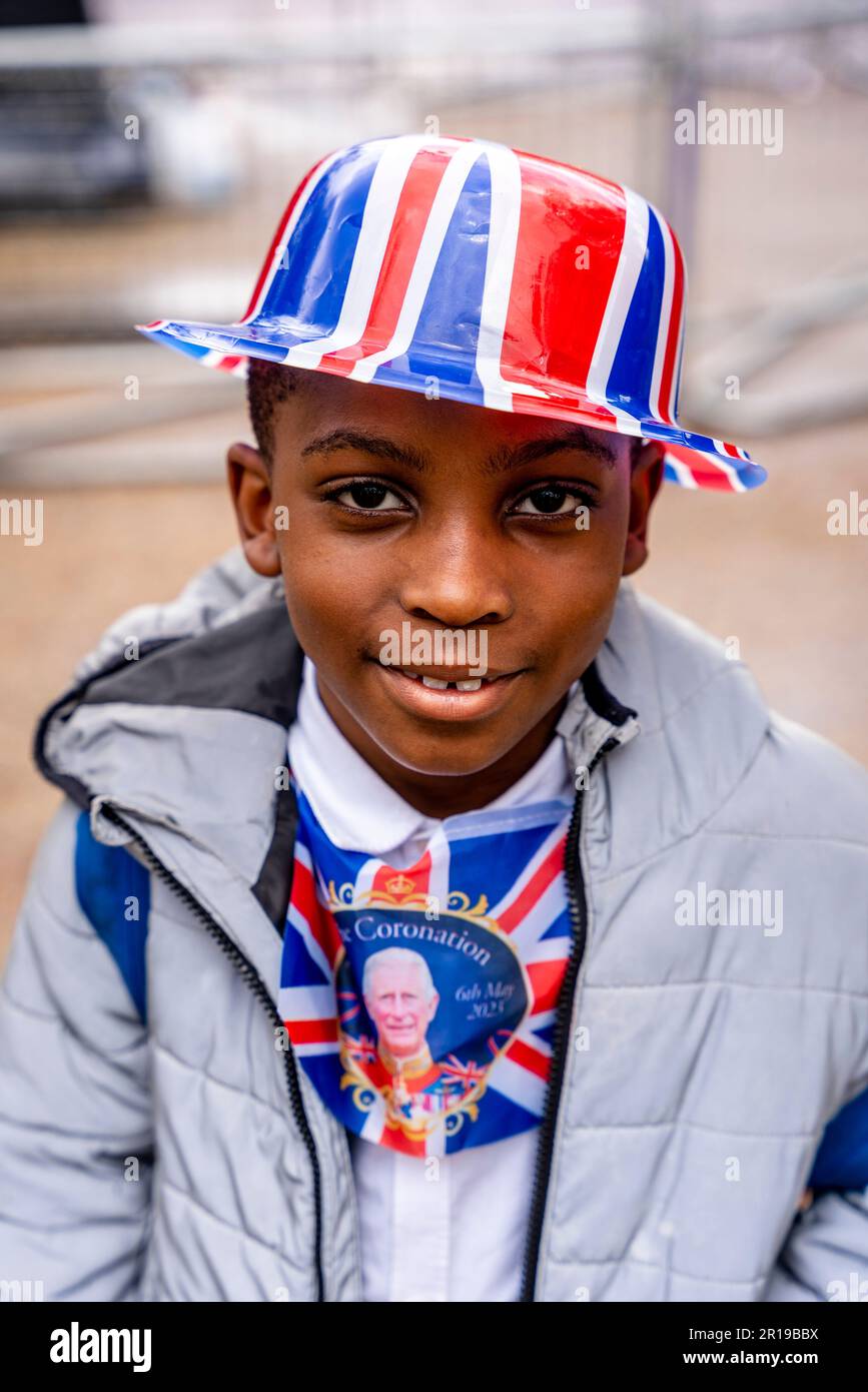 A Young Boy Poses For A Photo In The Mall Before The Coronation of King ...