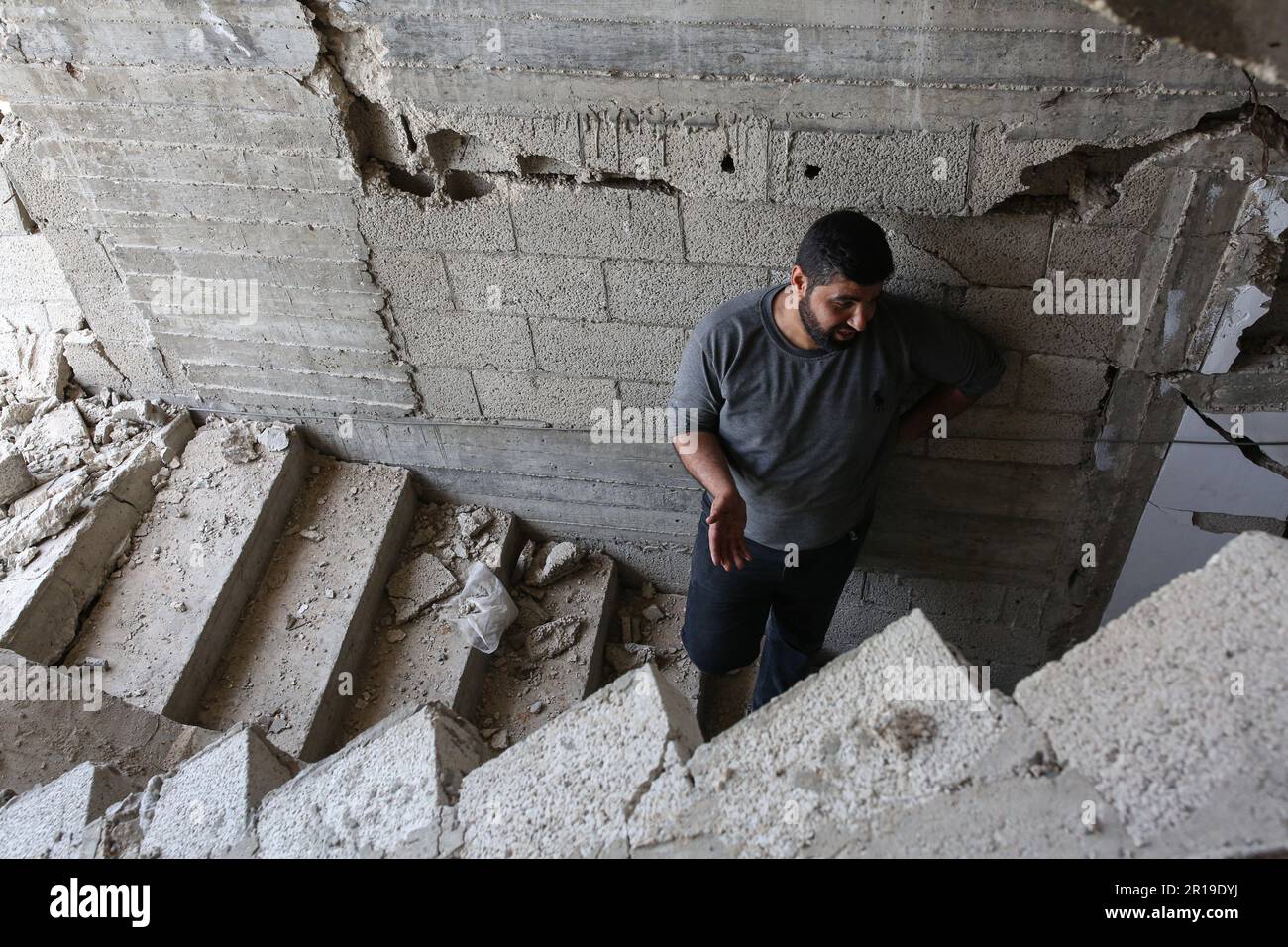 Gaza, Gaza Strip, Palestine. 12th May, 2023. Zaher Bashir stands on the ...
