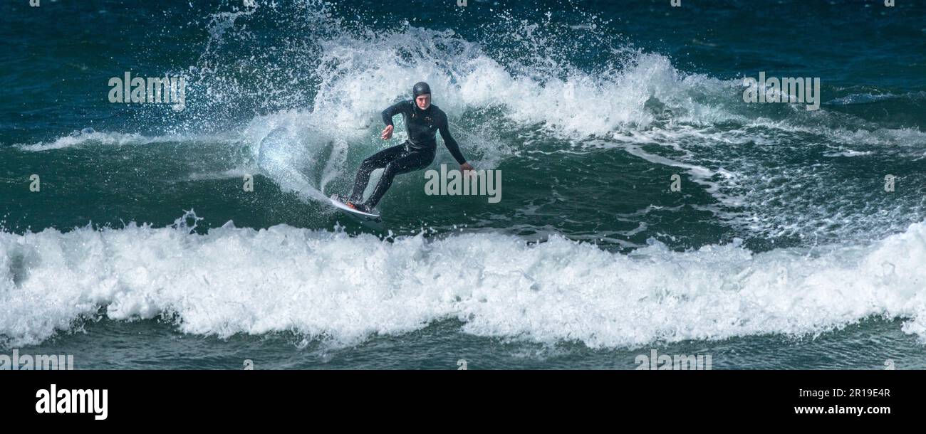 A panoramic image of spectacacular surfing action at Fistral in Newquay ...