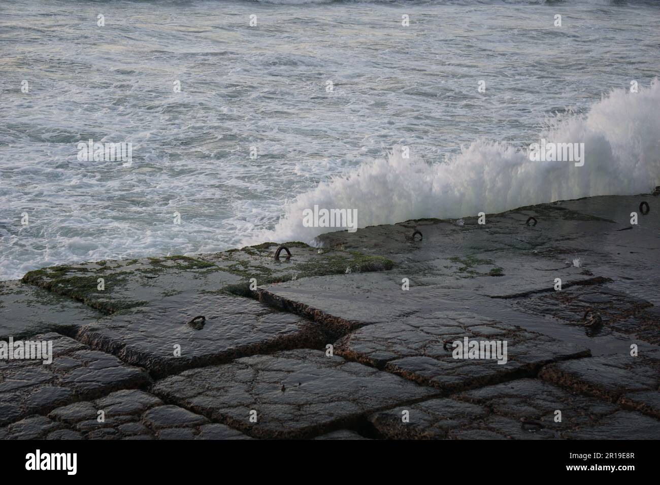 Mediterranean waves hitting the stones in Alexandria, Egypt Stock Photo ...