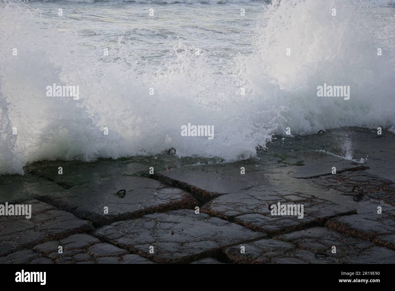 Mediterranean waves hitting the stones in Alexandria, Egypt Stock Photo ...