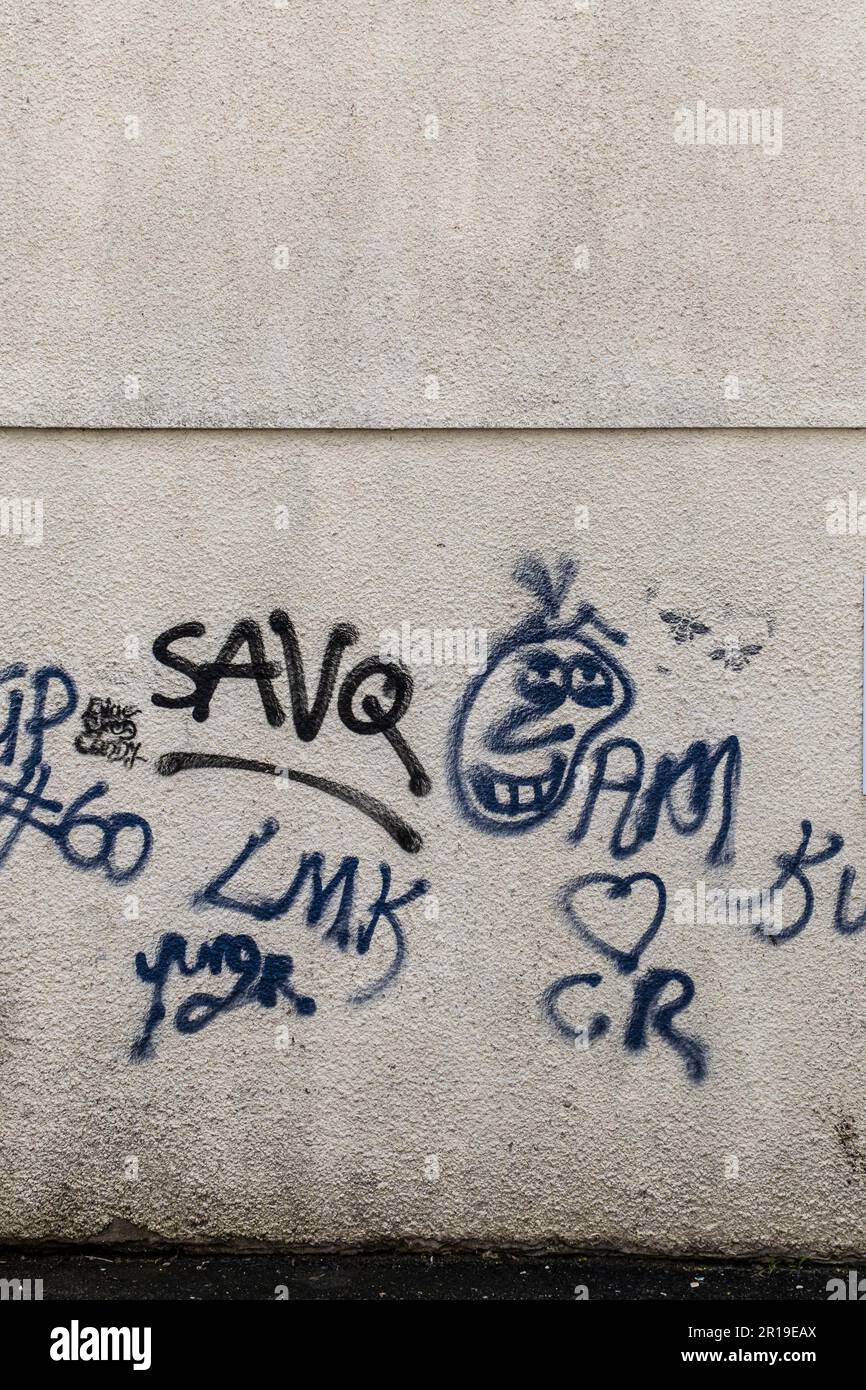 Graffiti Tag Tags sprayed on a wall in Newquay Town centre in Cornwall ...