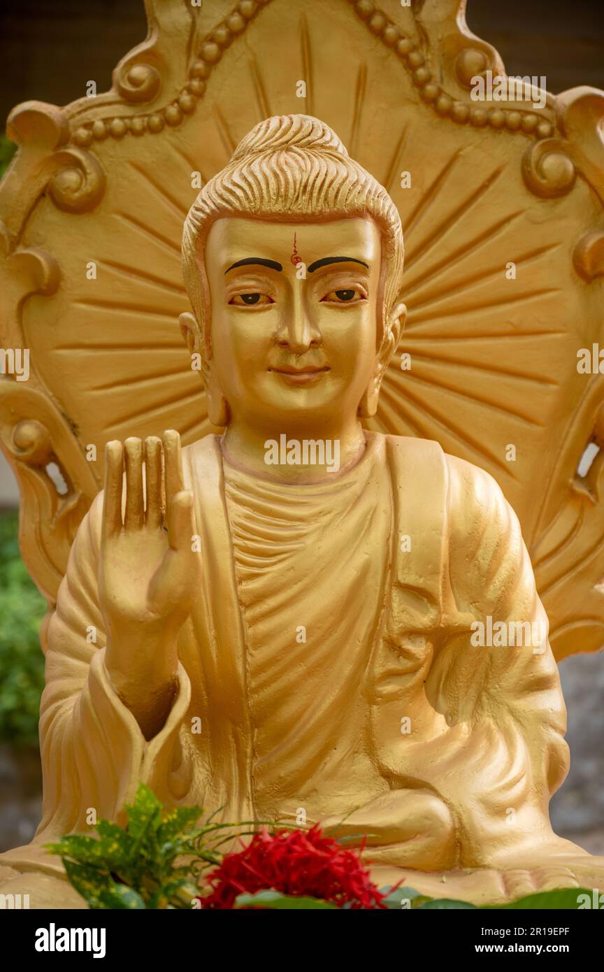 Gold coloured seated statue of Buddha at Vimukti Bibeshan Bhabna Kendra ...