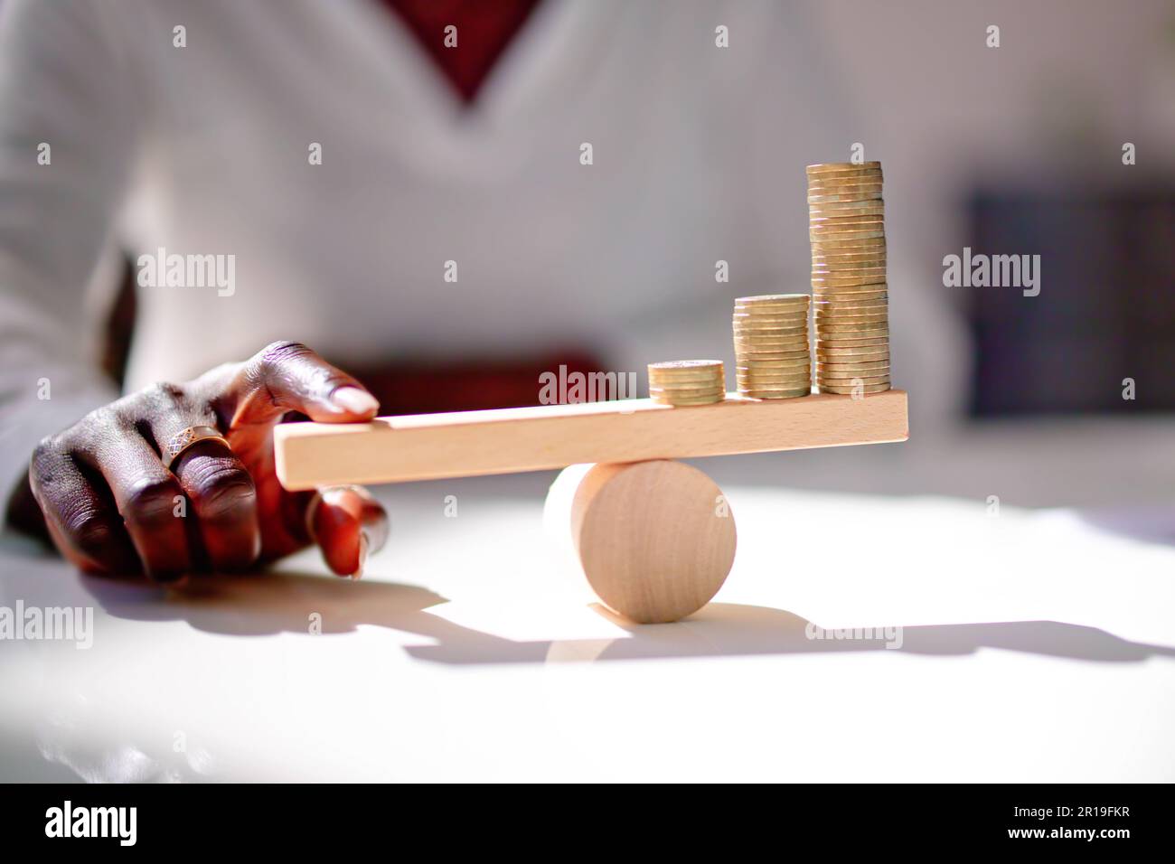 African American Financial Saving Balance And Stacked Coins Stock Photo ...