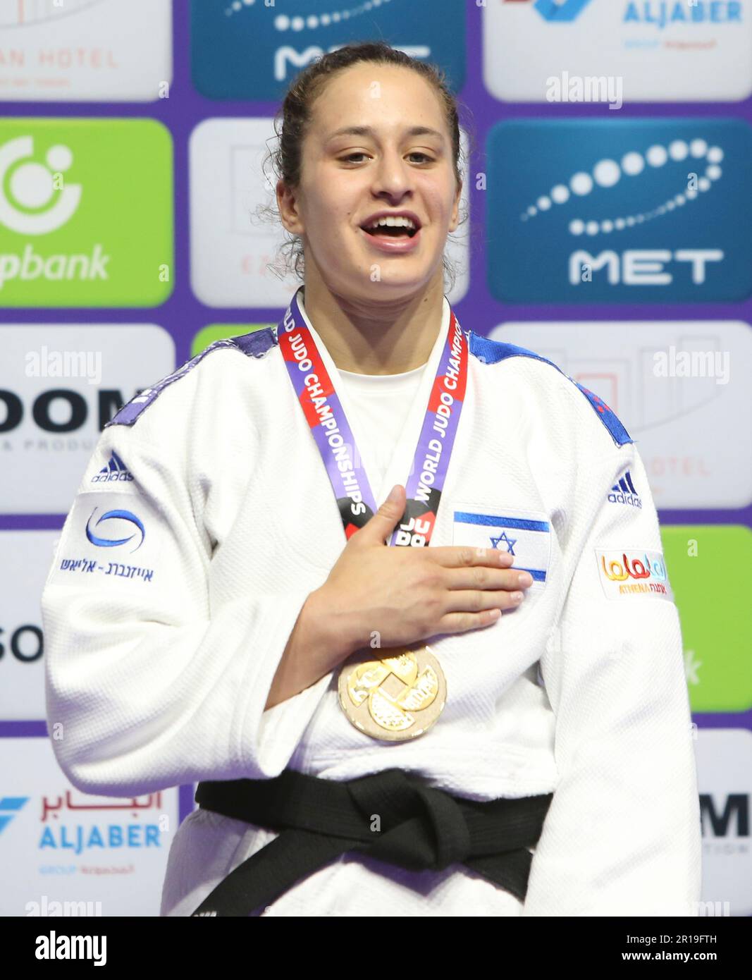 Inbar Lanir of Israel, poses with her gold medal after she beats Audrey ...