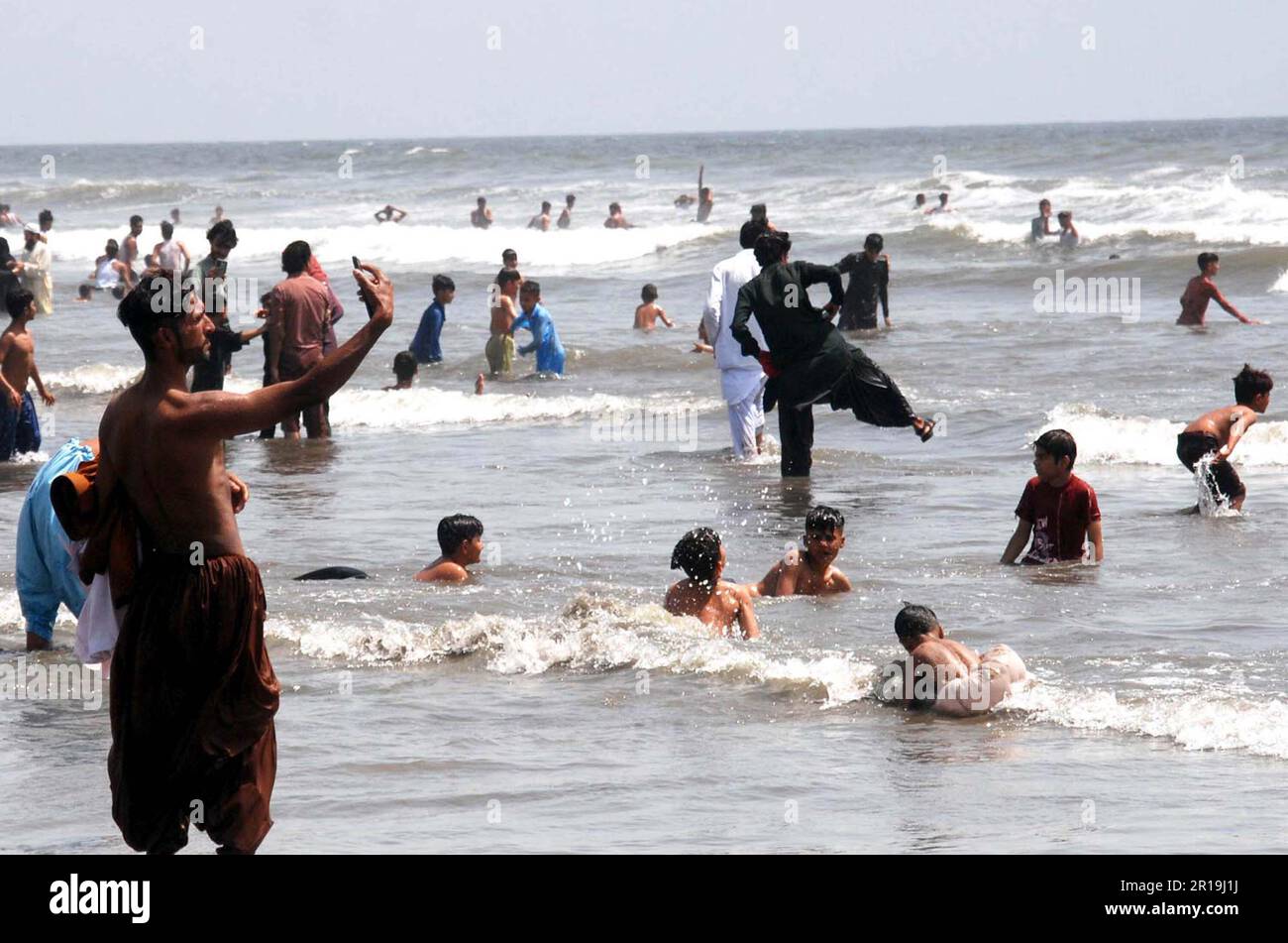 A large numbers of people are enjoying and cooling themselves during a hot weather of summer ...