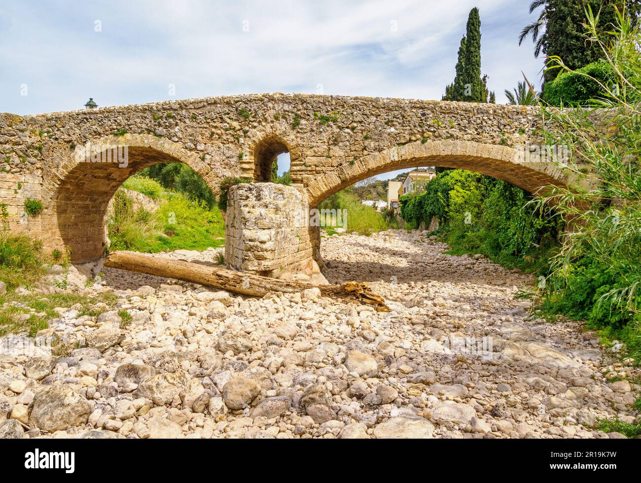 Pont Roma the Roman bridge over the dry Torrent de Sant Jordi through ...
