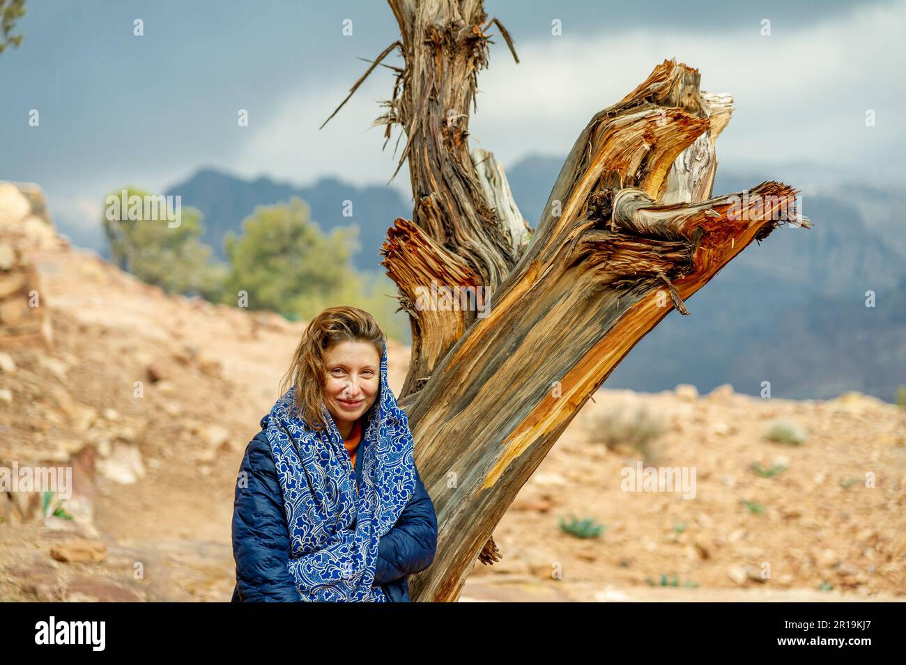 Tourist posing in Petra Jordan on one of the Bedouin trails.Petra ...