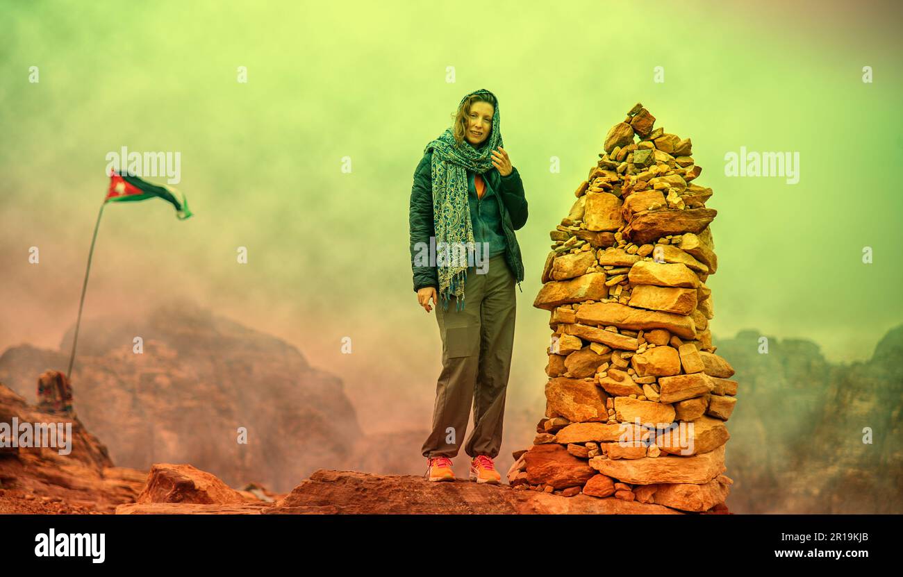 Tourist posing in Petra Jordan on one of the Bedouin trails.Petra ...