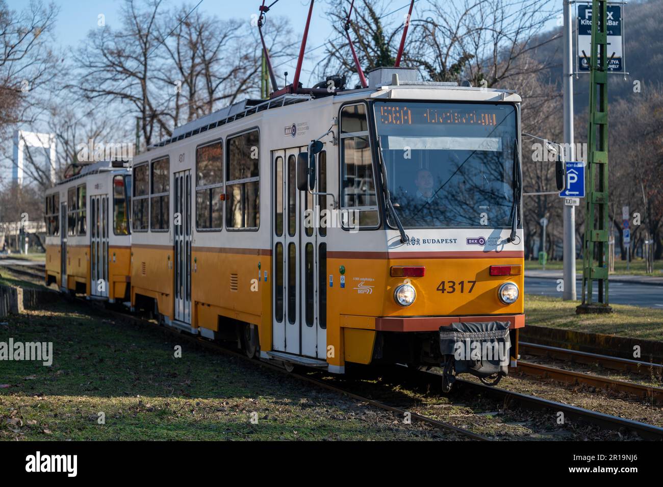 Distinctive yellow and white railway train and carriage providing ...