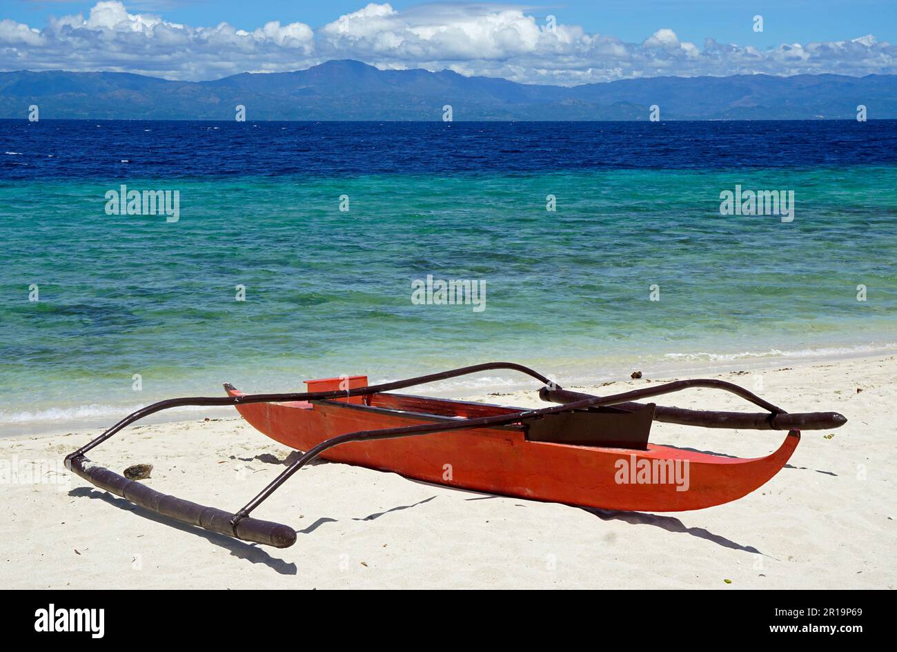 traditional outrigger boats at the beach of bohol on the philippines ...