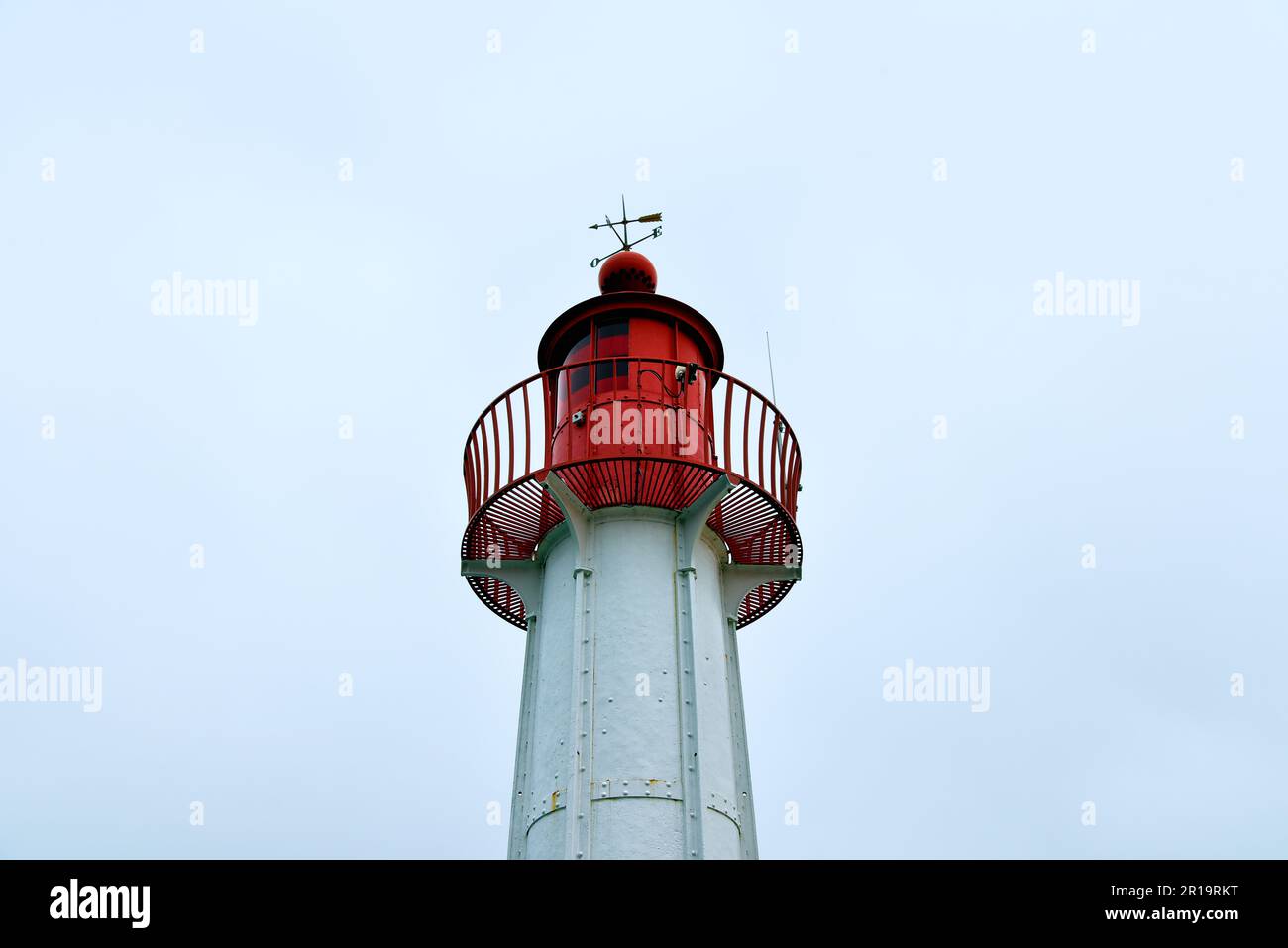 The Trouville-sur-Mer lighthouse against a blue sky in France Stock ...