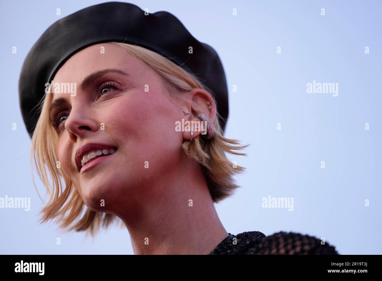 Actress Charlize Theron poses for photographers upon arrival at the ...