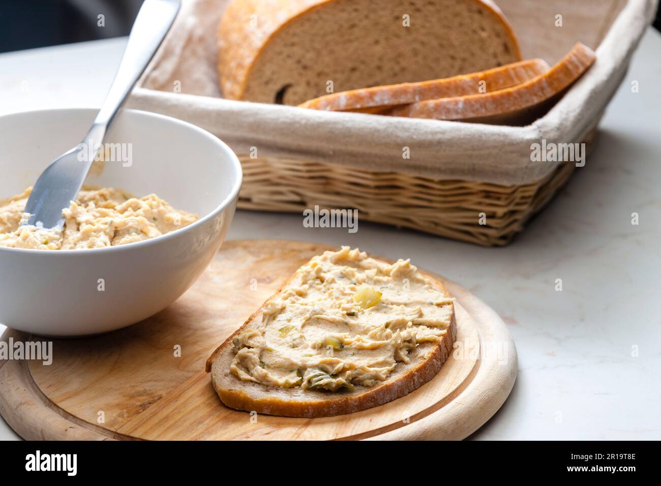 cracklings spread with pickled cucumber on slice of bread Stock Photo ...