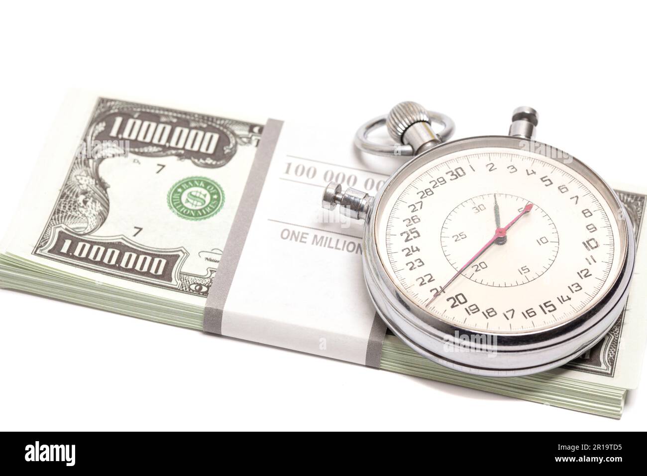 Stopwatch with one million dollar bills. Time is money concept Stock ...