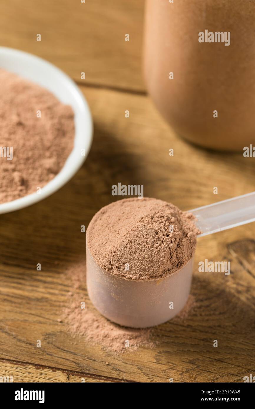 Organic Chocolate Whey Protein Powder in a Scoop Stock Photo - Alamy