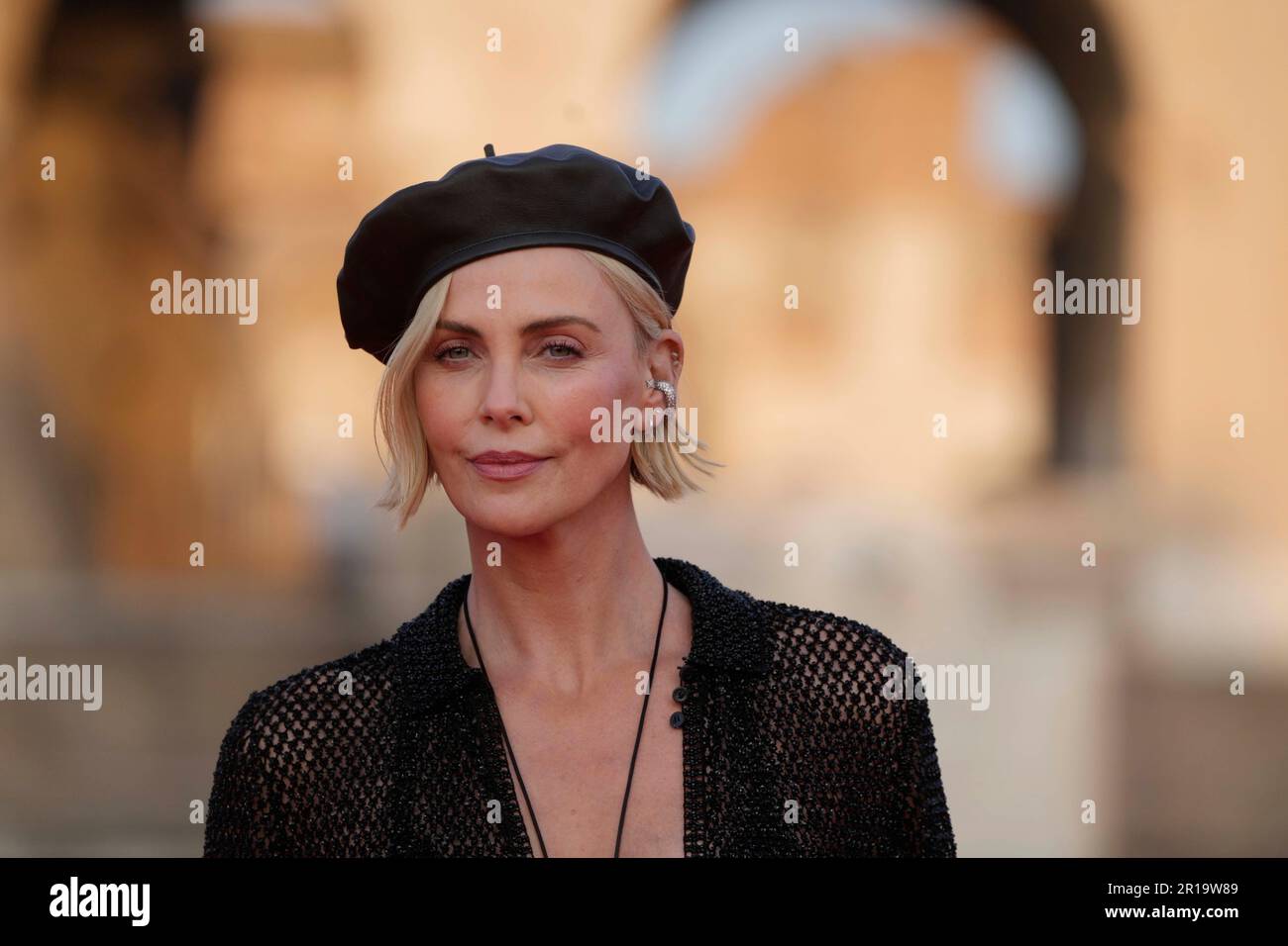 Actress Charlize Theron poses for photographers upon arrival at the ...