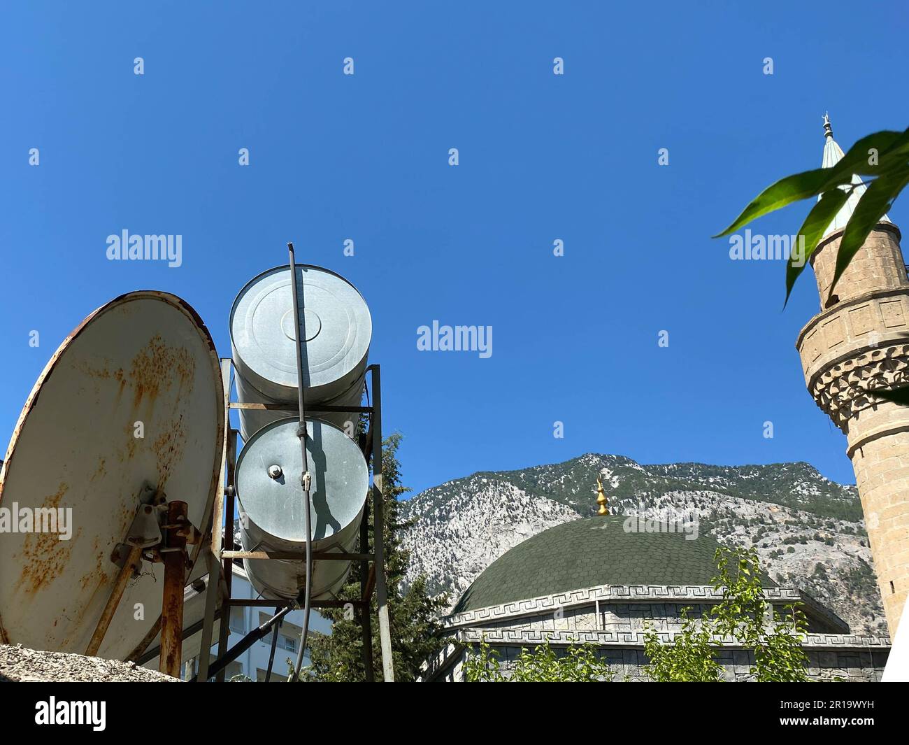 large barrels on the roof of the house adapted for heating water Stock ...