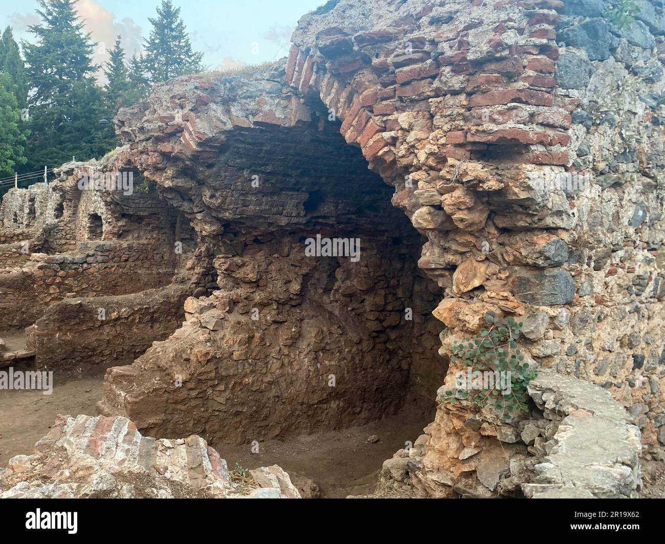 The ruins of an ancient old broken ruined medieval fortress made of ...