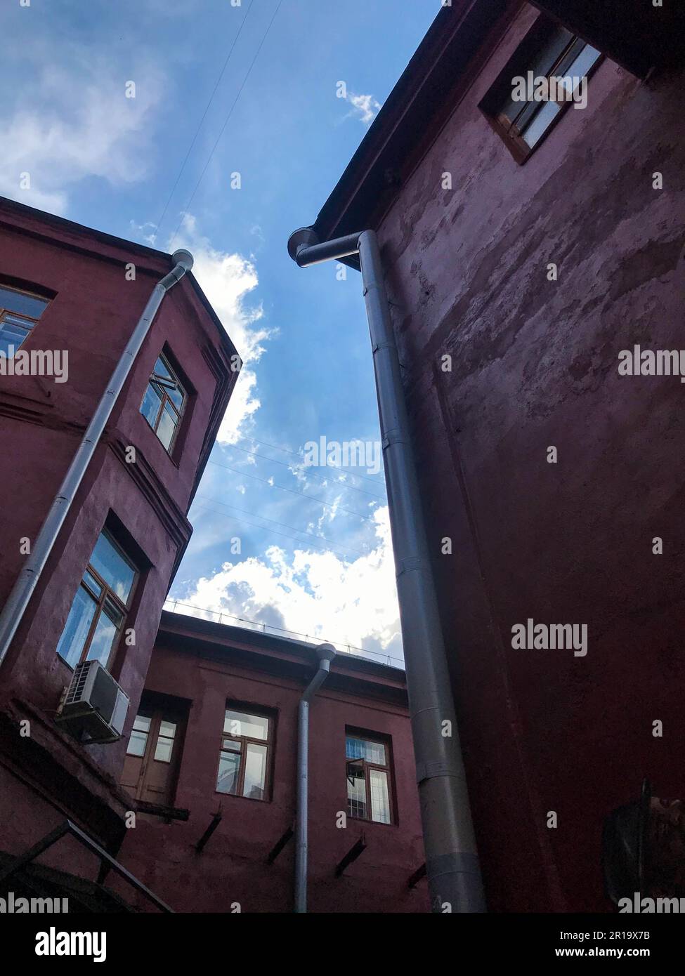 red buildings, a cozy courtyard for dating and spending time in a cafe ...