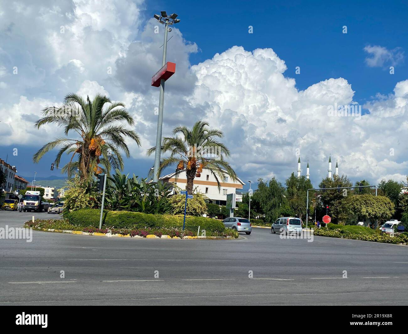 Crossroad, road, roundabout and palm trees in Turkey on vacation in a ...