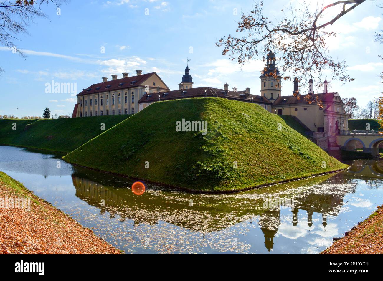 Old, ancient medieval castle with spiers and towers, walls of stone and ...