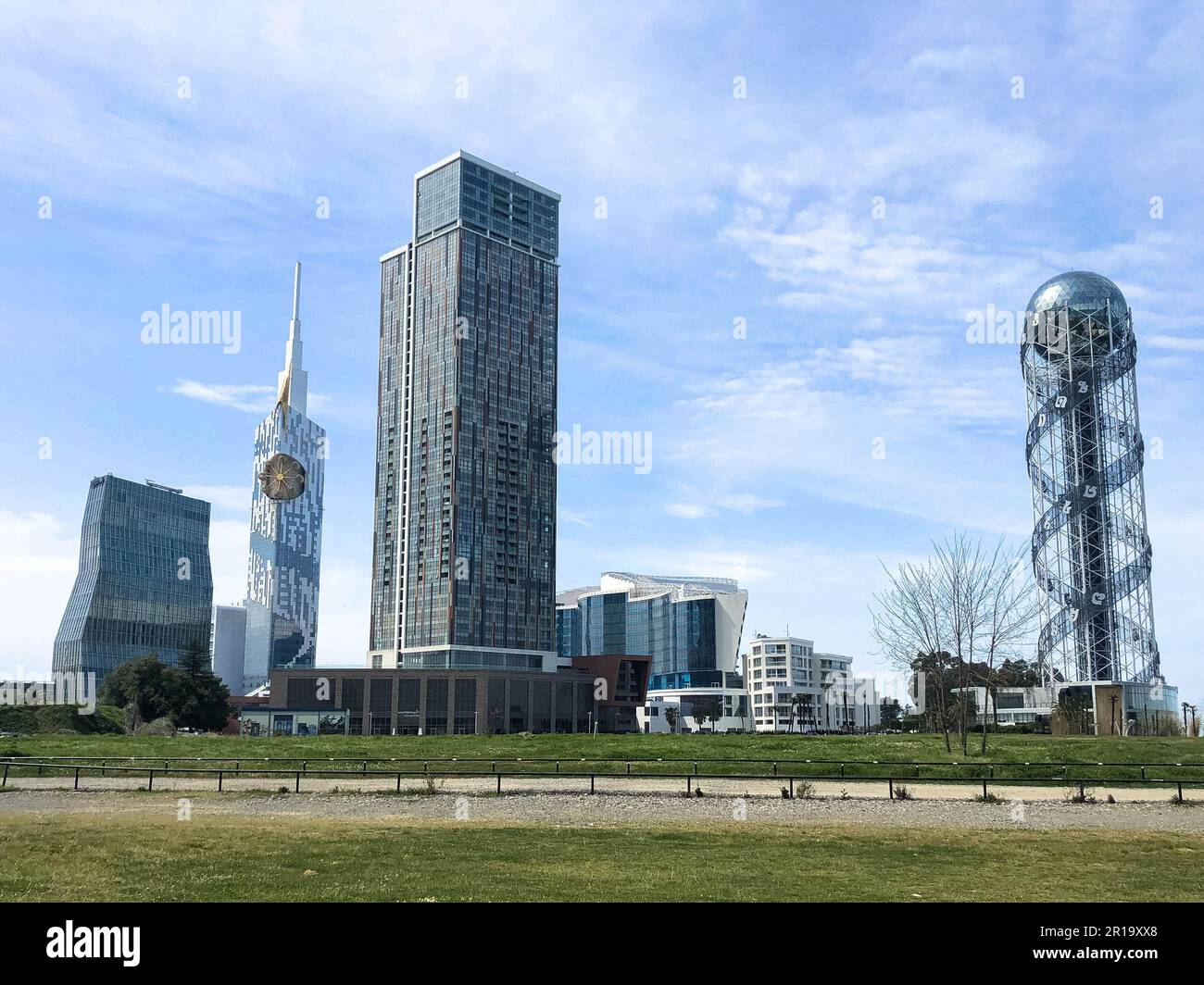 A large beautiful metal modern spiral high architecture tower alphabet ...