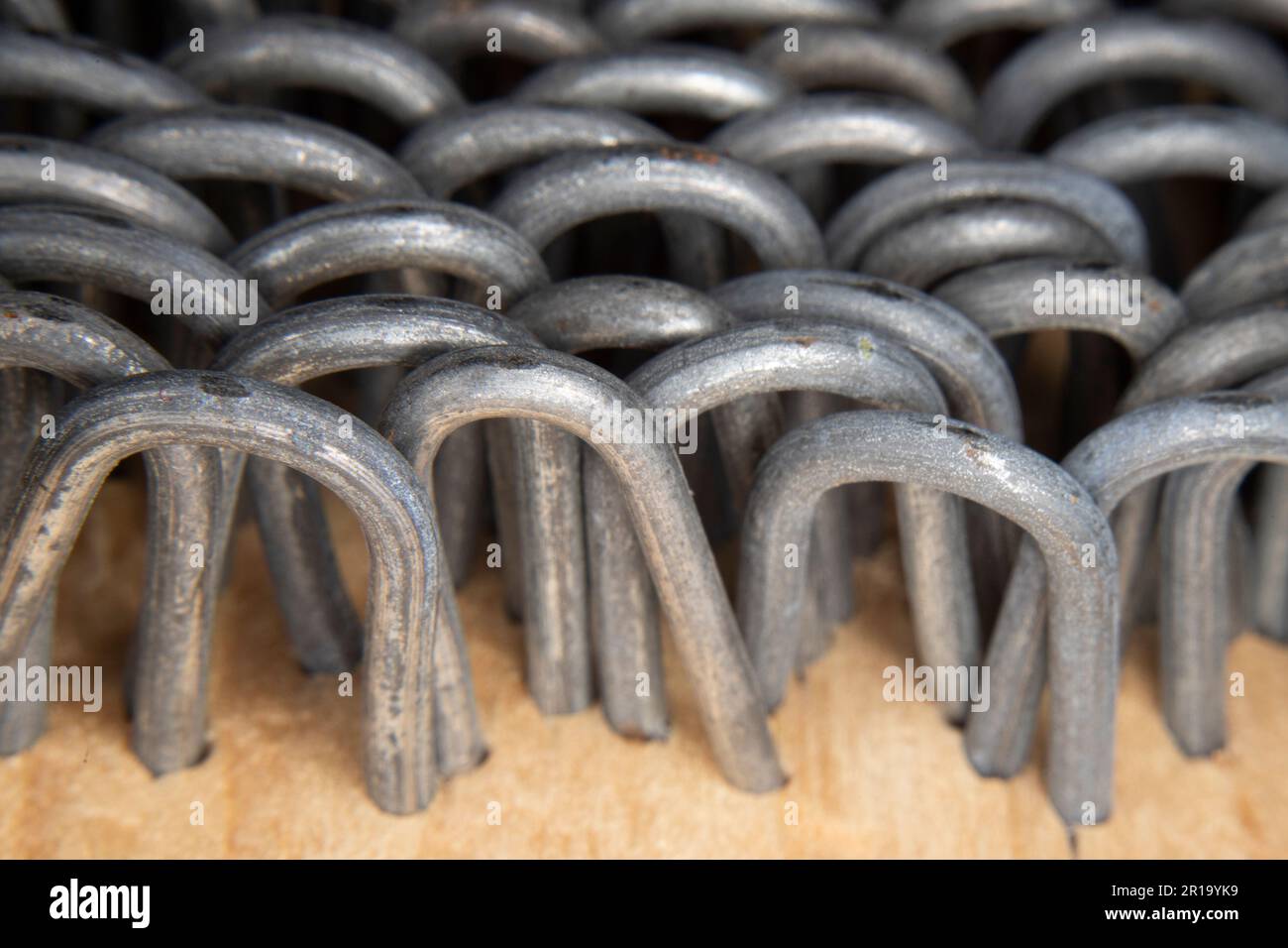 heavy barbed wire staples for construction and carpentry creating black ...