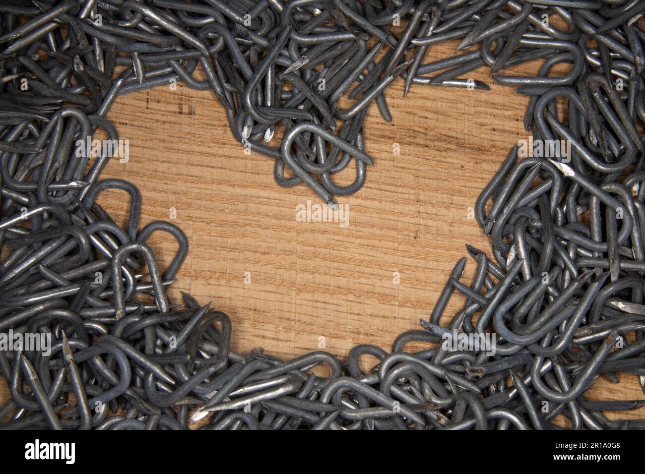 heart shaped border of heavy duty staples used for construction or ...