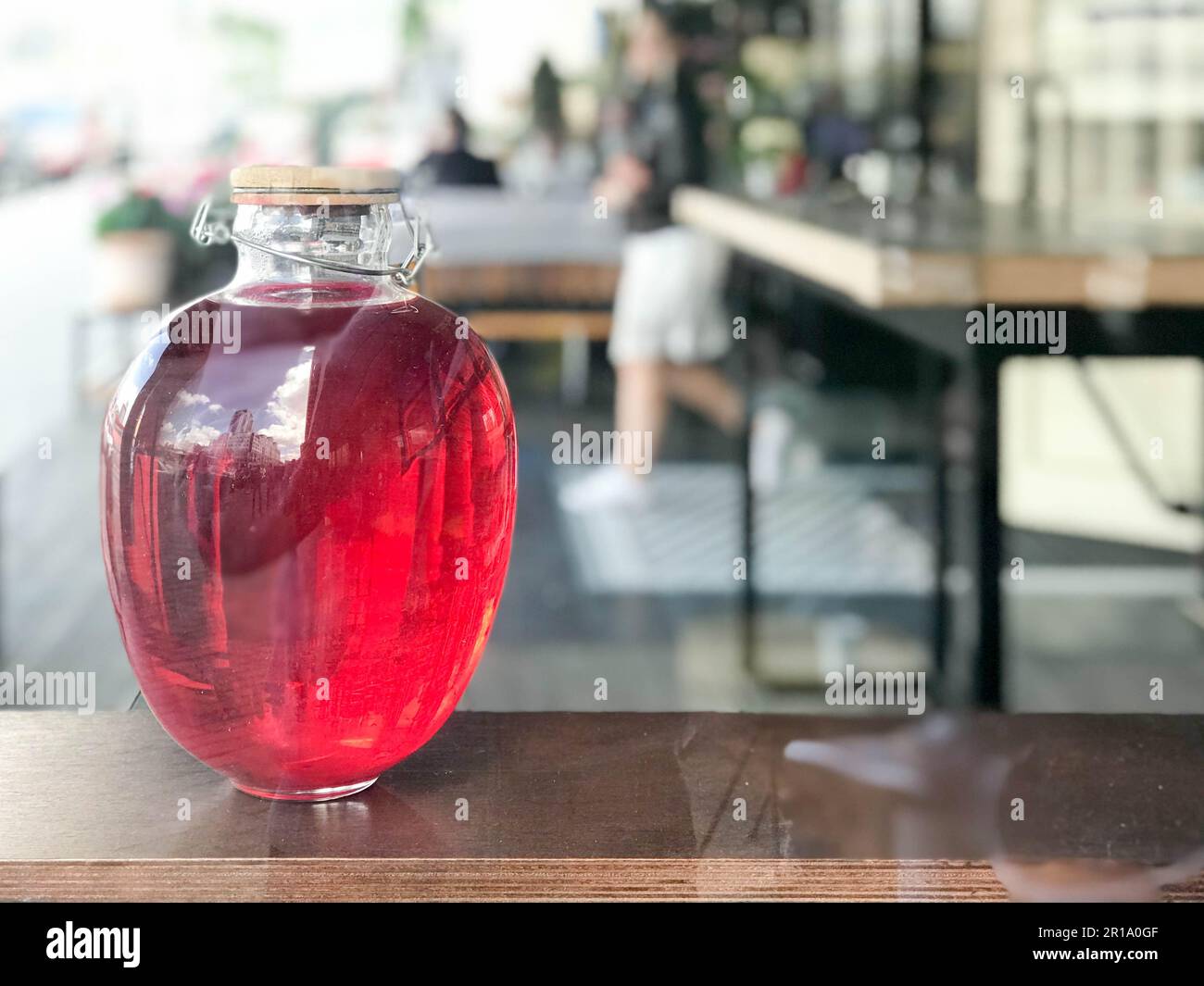 A large beautiful three-liter glass bank of a ham, juice, potion, a ...