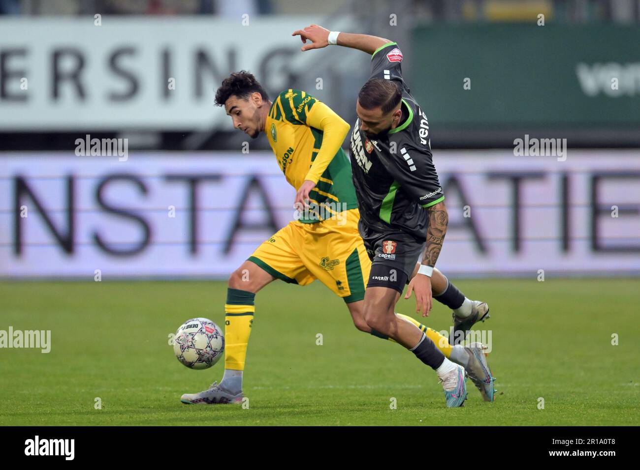 THE HAGUE - (lr) Malik Sellouki of ADO Den Haag, Toine van Huizen of FC ...