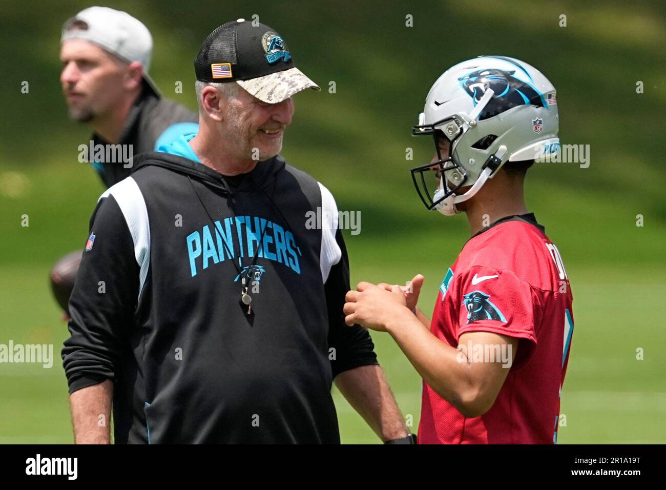 Carolina Panthers quarterback Bryce Young talks with head coach Frank ...